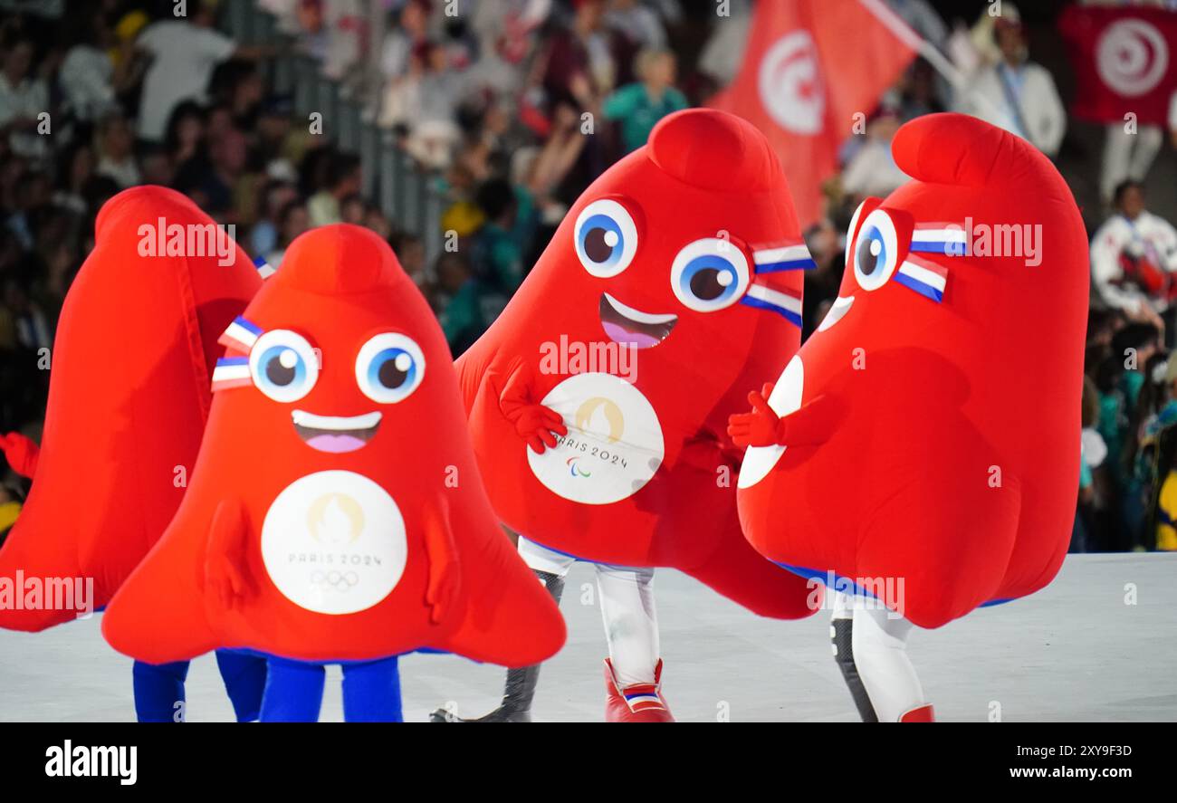 Performers dressed as the 2024 Paris Paralympic Games mascot Phryge on ...