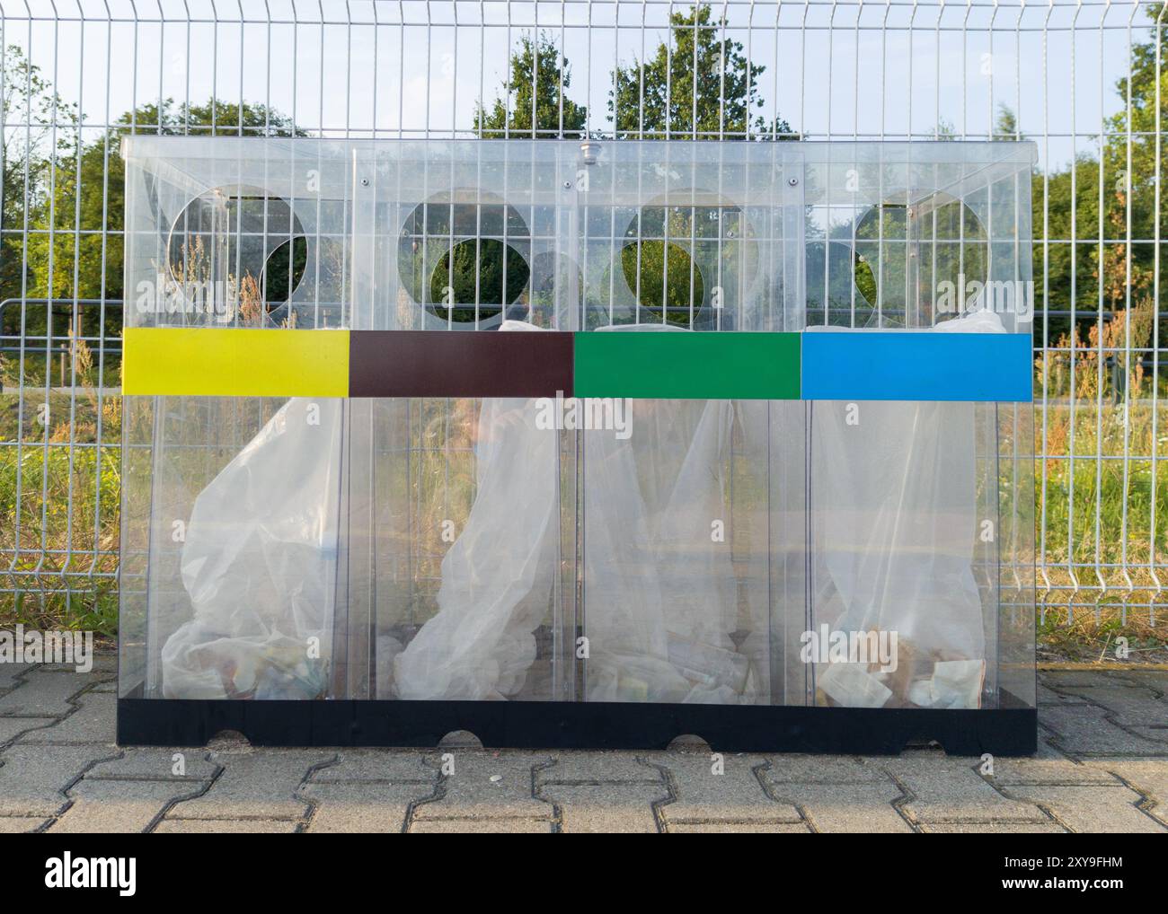 Modern Recycling Station with Multiple Bins Stock Photo - Alamy