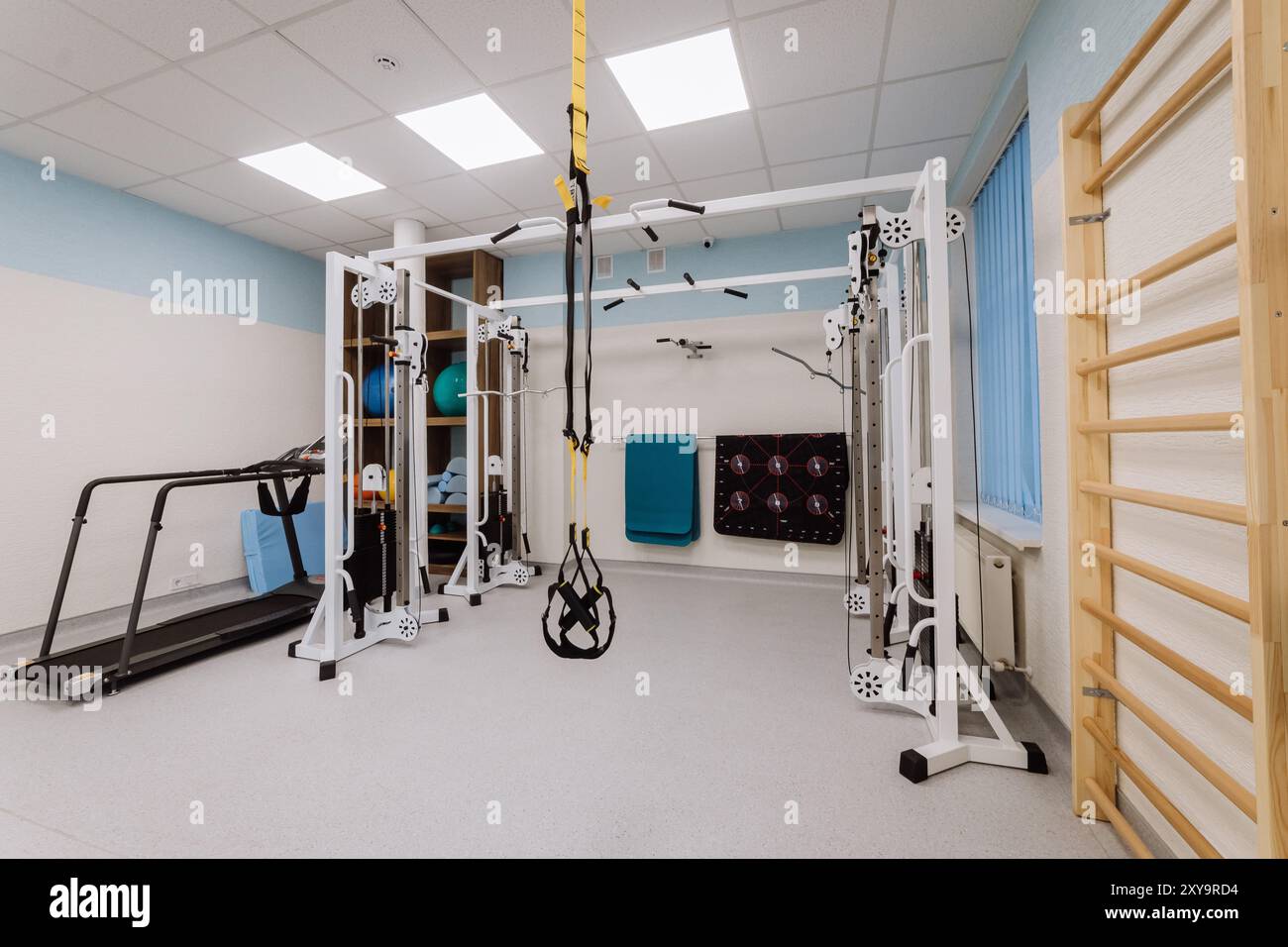 Rehabilitation room equipped with advanced therapy tools and equipment ...