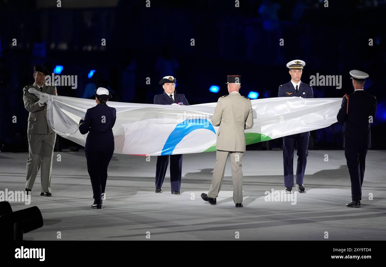The Paralympic flag is raised during the opening ceremony of the Paris ...