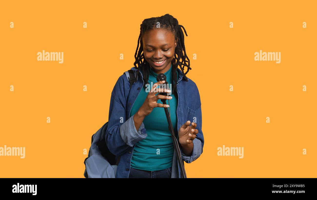 African american motivational speaker talking in microphone, addressing ...