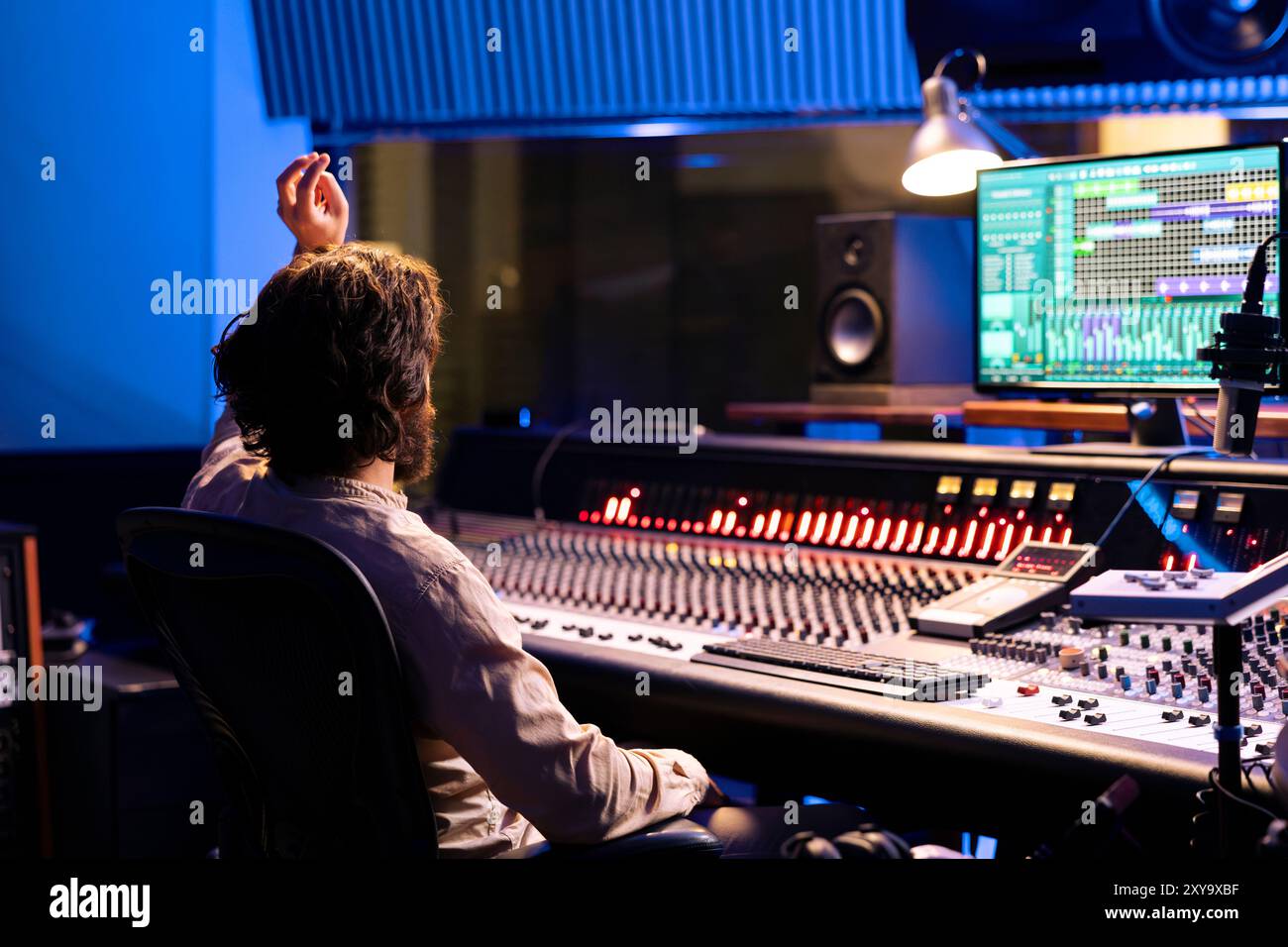 Sound designer editing recording hi-res stock photography and images ...