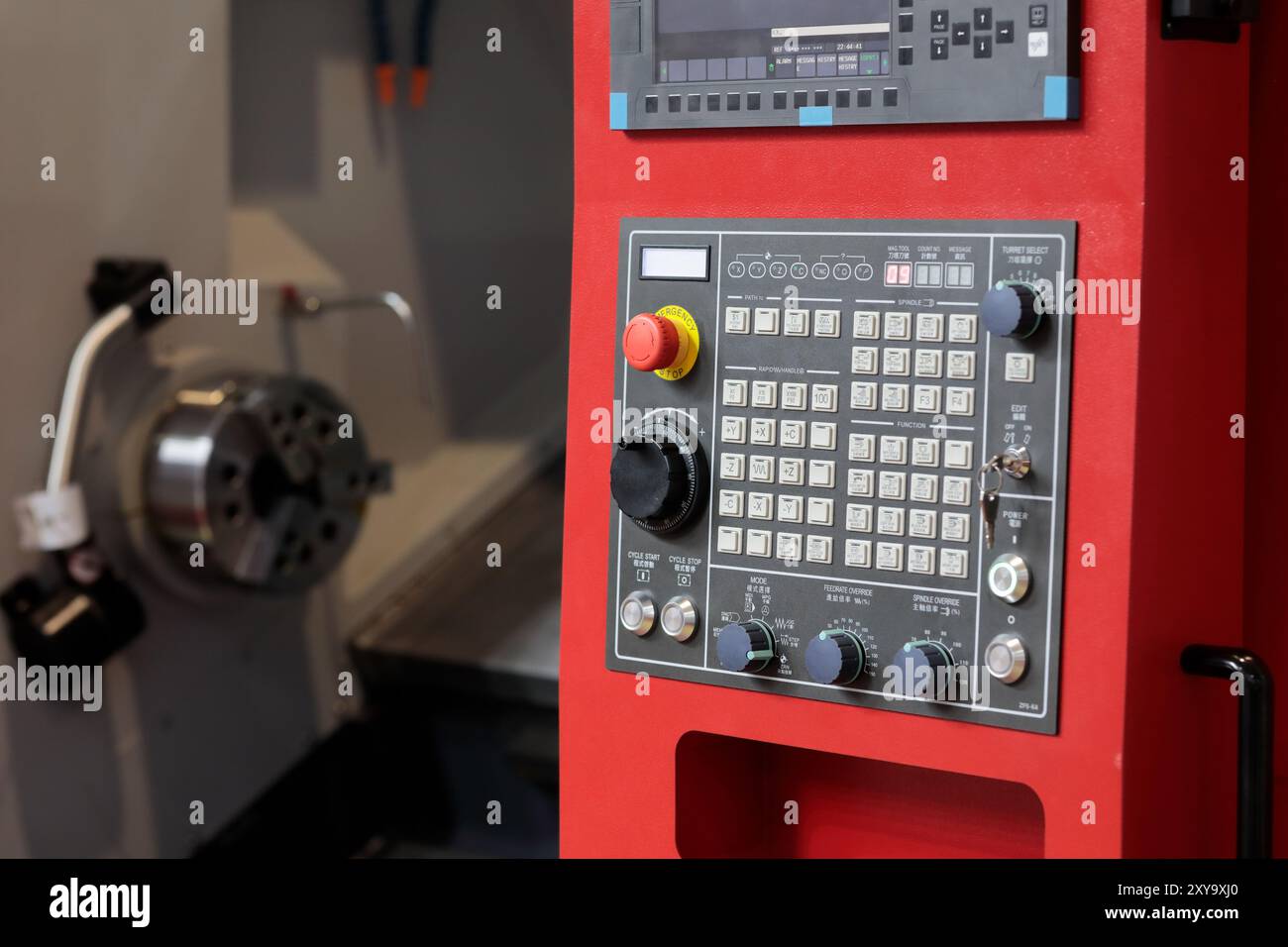 Industrial metalworking slant bed CNC lathe machine close up. Selective ...