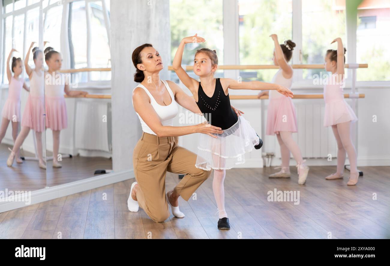 Ballet lesson for little girls - choreography teacher shows little ...