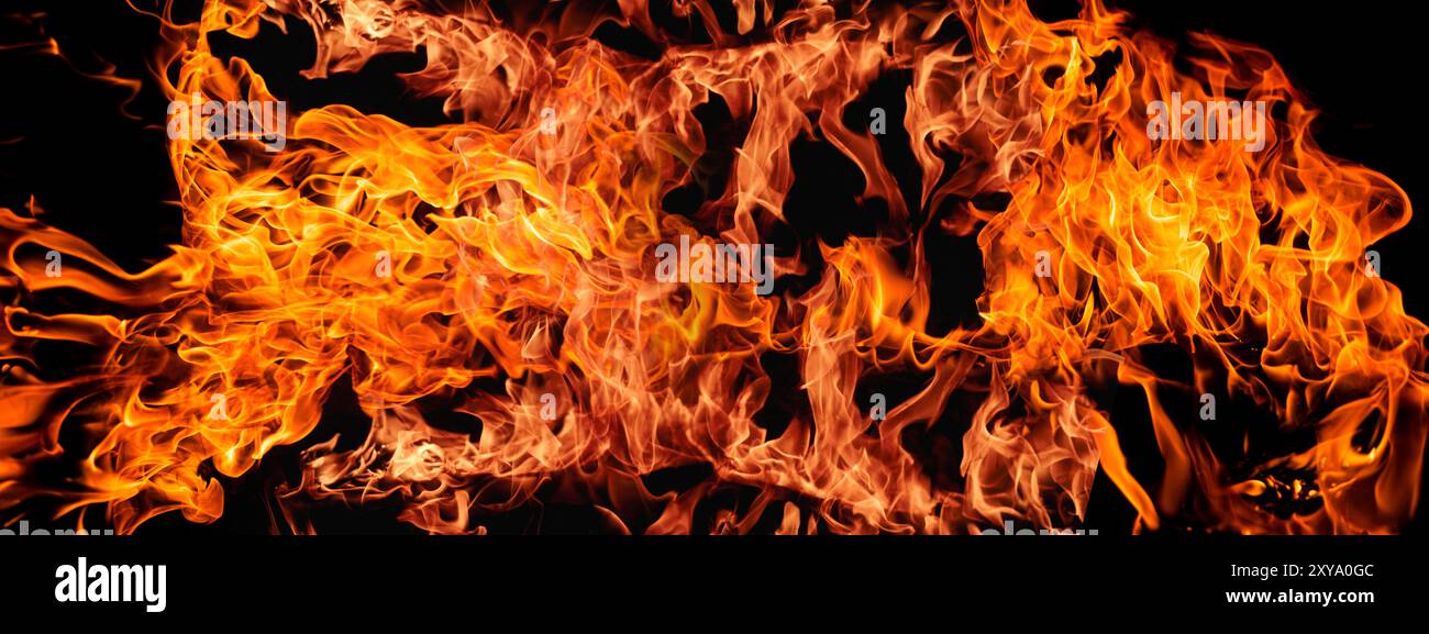 Fire flame background. Hell bonfire. Texture of fire on a black ...