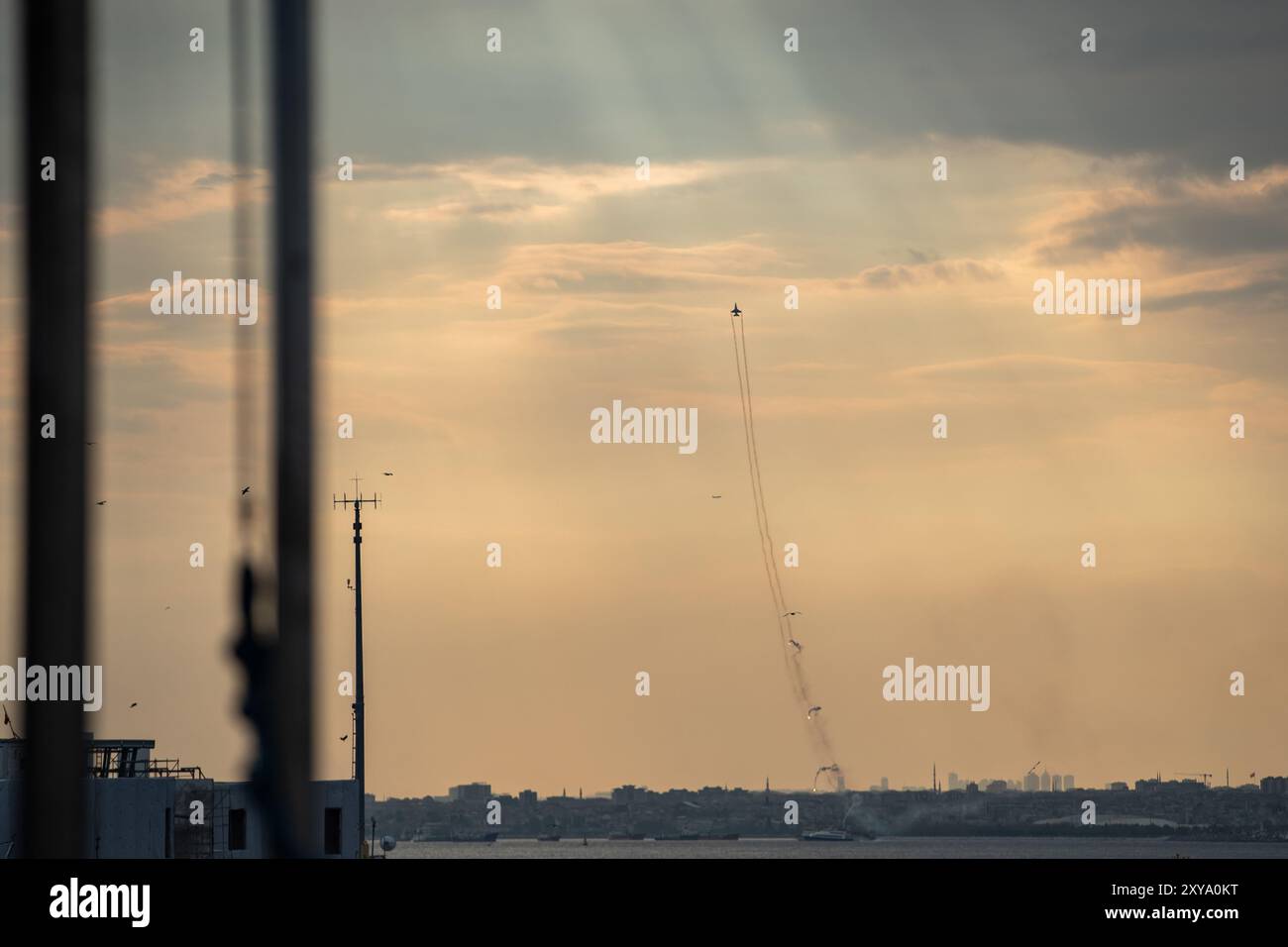 A SOLOTURK plane seen floating among the clouds seen from Kadikoy ...