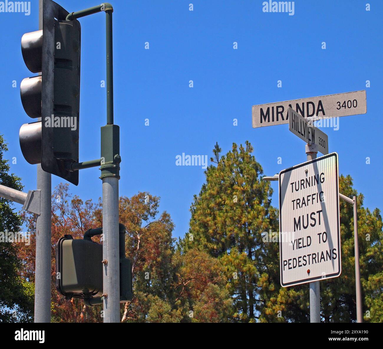 turning traffic must yield to pedestrians sign in California Stock ...