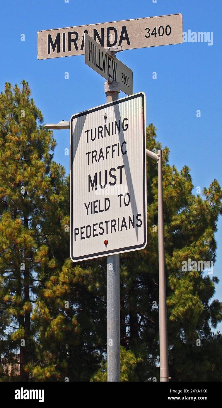 turning traffic must yield to pedestrians sign in California Stock ...