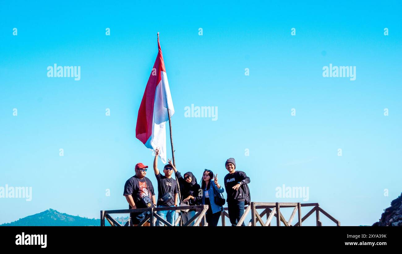 People vacation on Batu Pandang Ratapan Angin, one of the famous ...