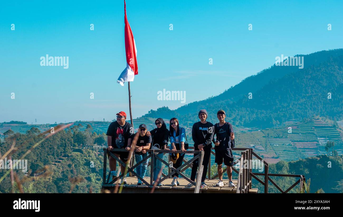 People vacation on Batu Pandang Ratapan Angin, one of the famous ...