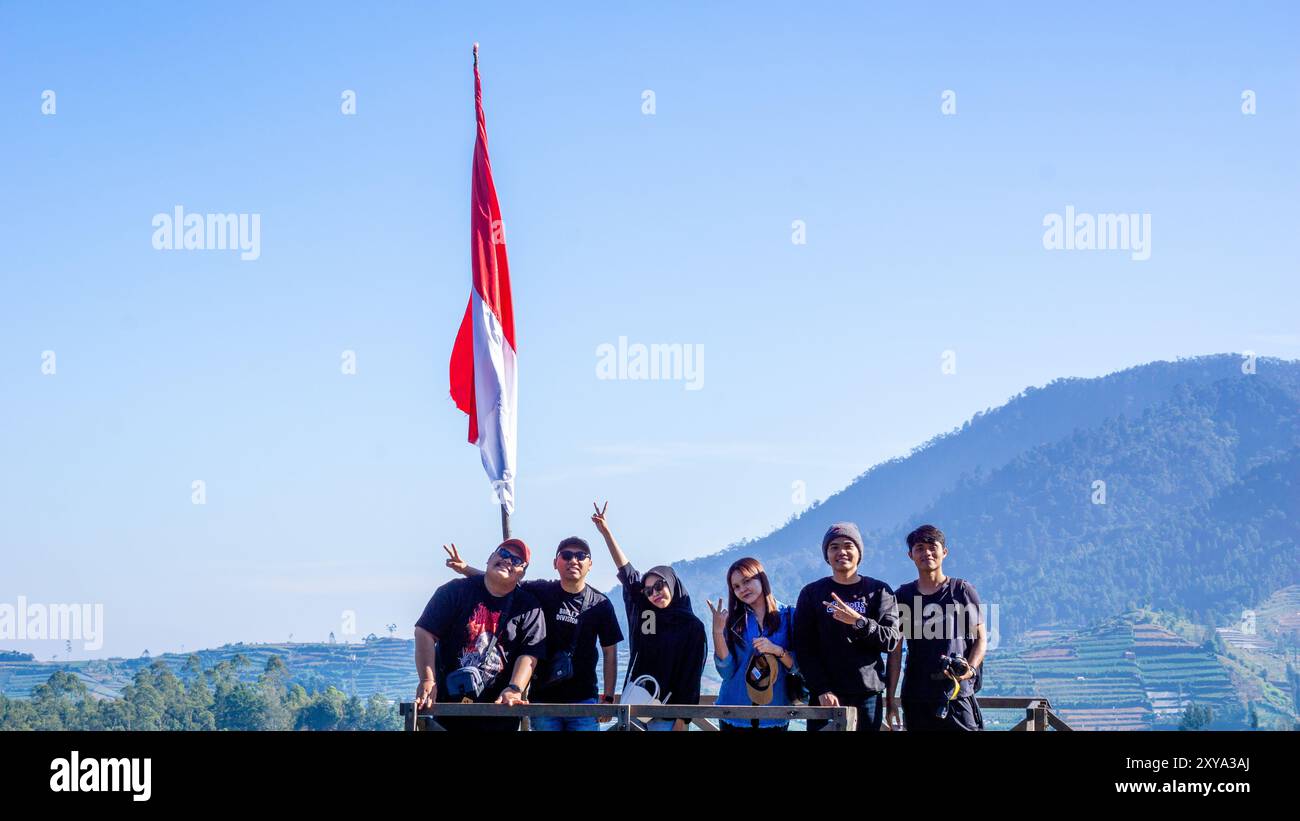People vacation on Batu Pandang Ratapan Angin, one of the famous ...