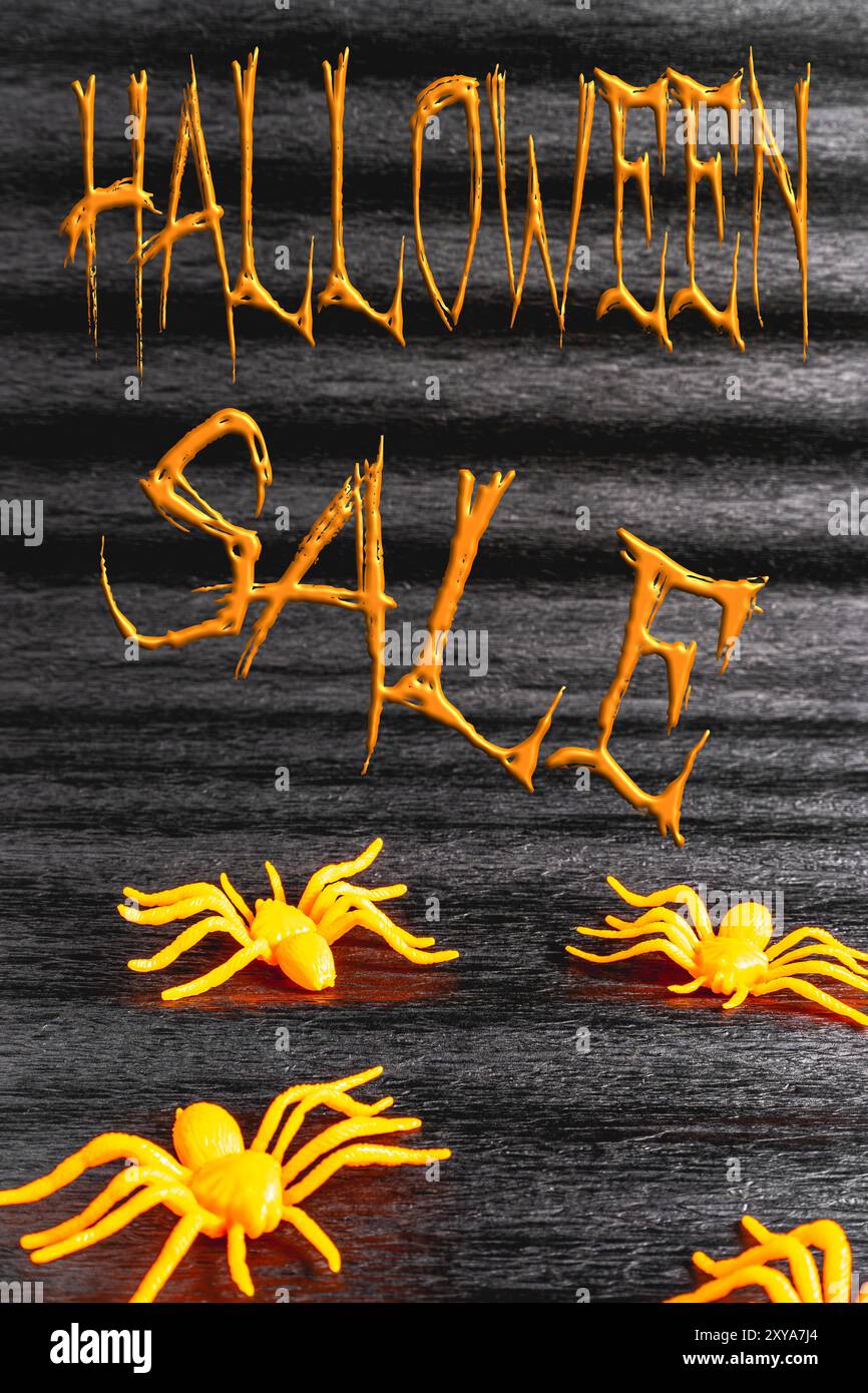 Background for a Halloween Sale, with orange letters and spiders, on a ...