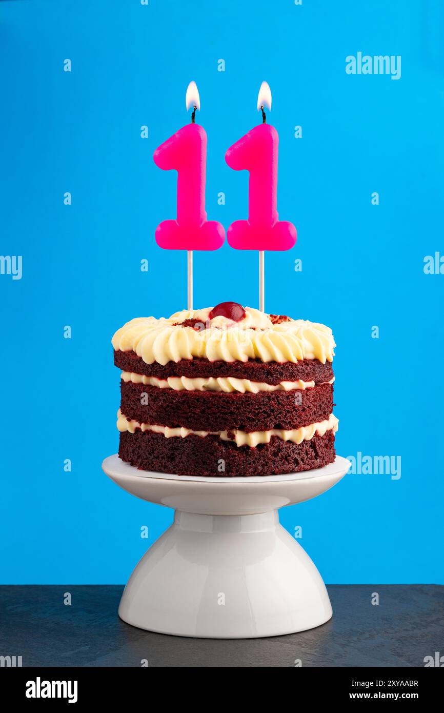 Birthday number 11 - Candle with red velvet cake Stock Photo - Alamy