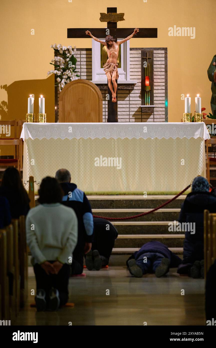 Veneration of the Holy Cross after Holy Mass in St James Church in ...