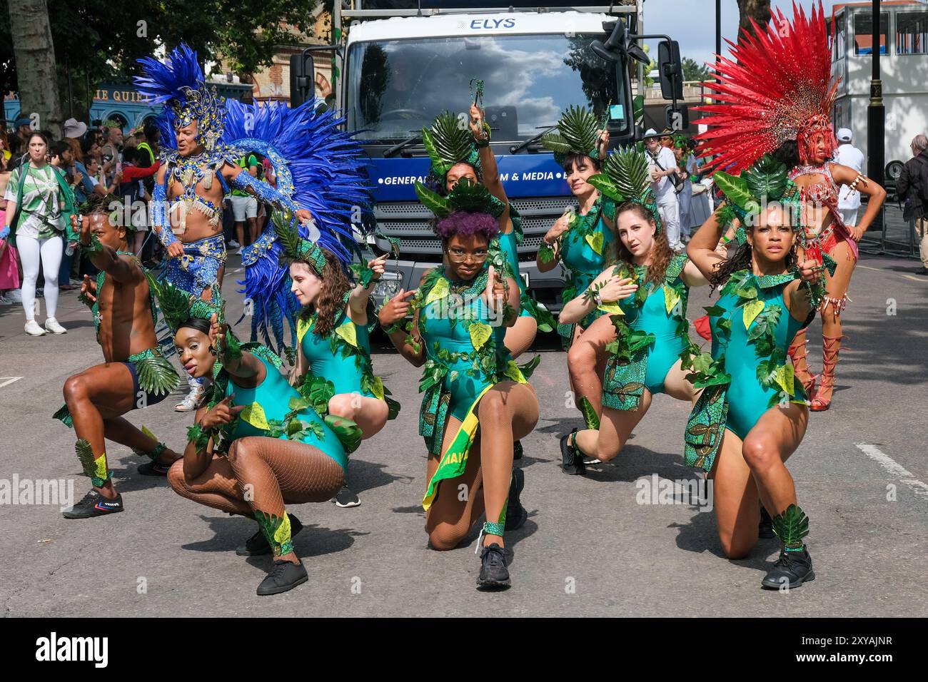 London, UK. Parade participants in colourful and elaborate costumes on ...
