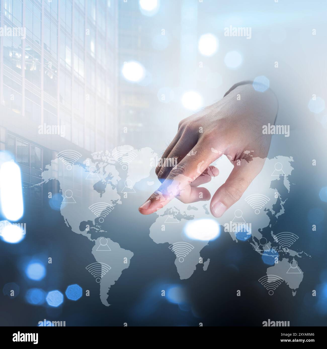 A hand is pointing at a map of the world. The map is filled with icons ...