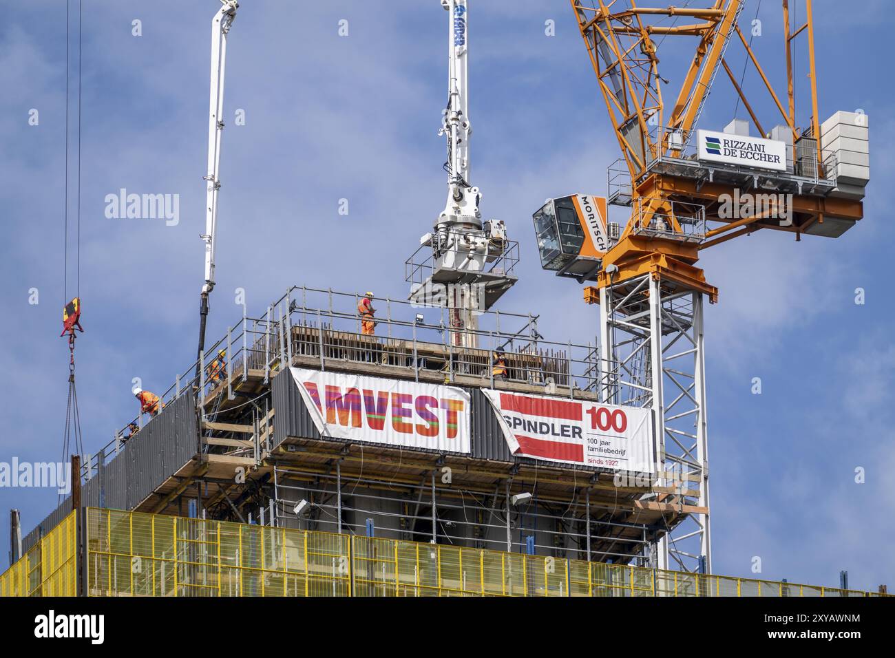 Concrete pump on a construction site of a new office building, in the ...