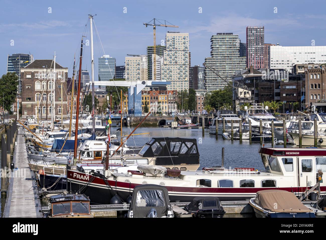Rotterdam Marina, behind high-rise buildings in the Maritiem District ...