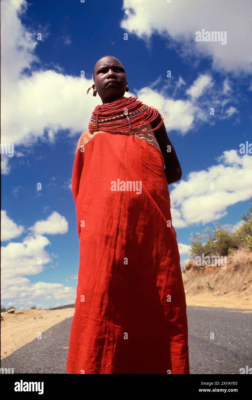 Samburu woman with traditional clothes on the road near Maralal ...