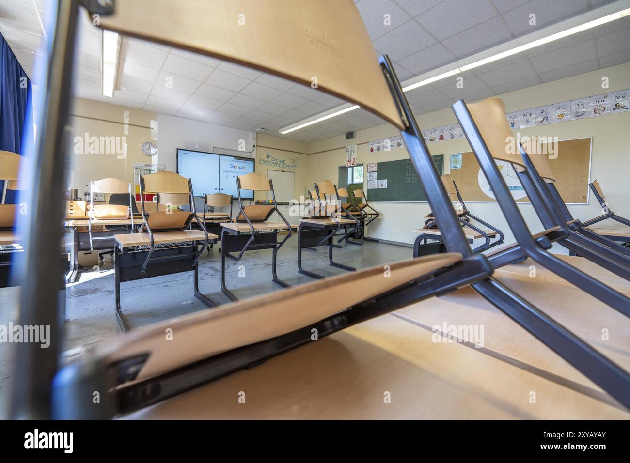 Classroom of a fourth grade, after school, the building is older but in ...