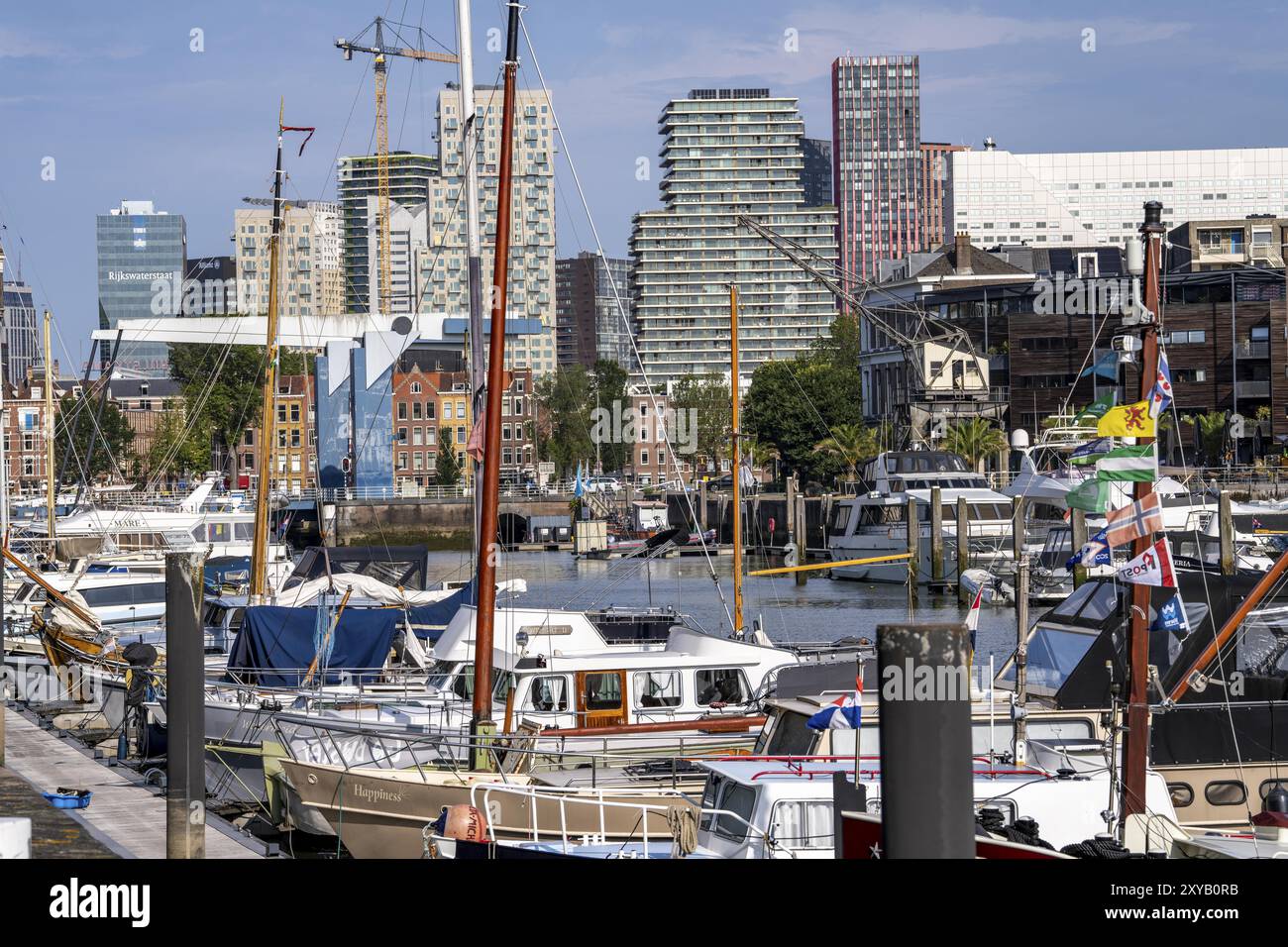 Rotterdam Marina, behind high-rise buildings in the Maritiem District ...