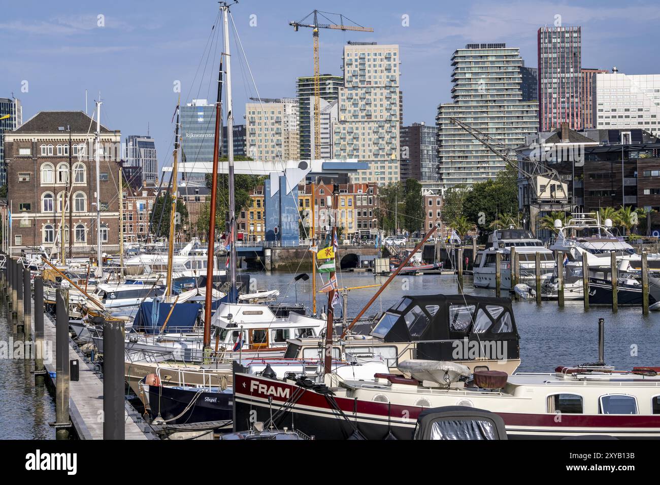 Rotterdam Marina, behind high-rise buildings in the Maritiem District ...