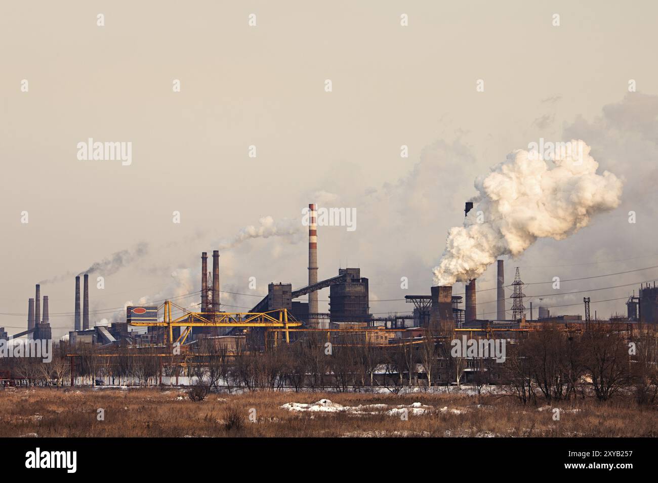 Smoking industrial zone factory chimneys hi-res stock photography and ...