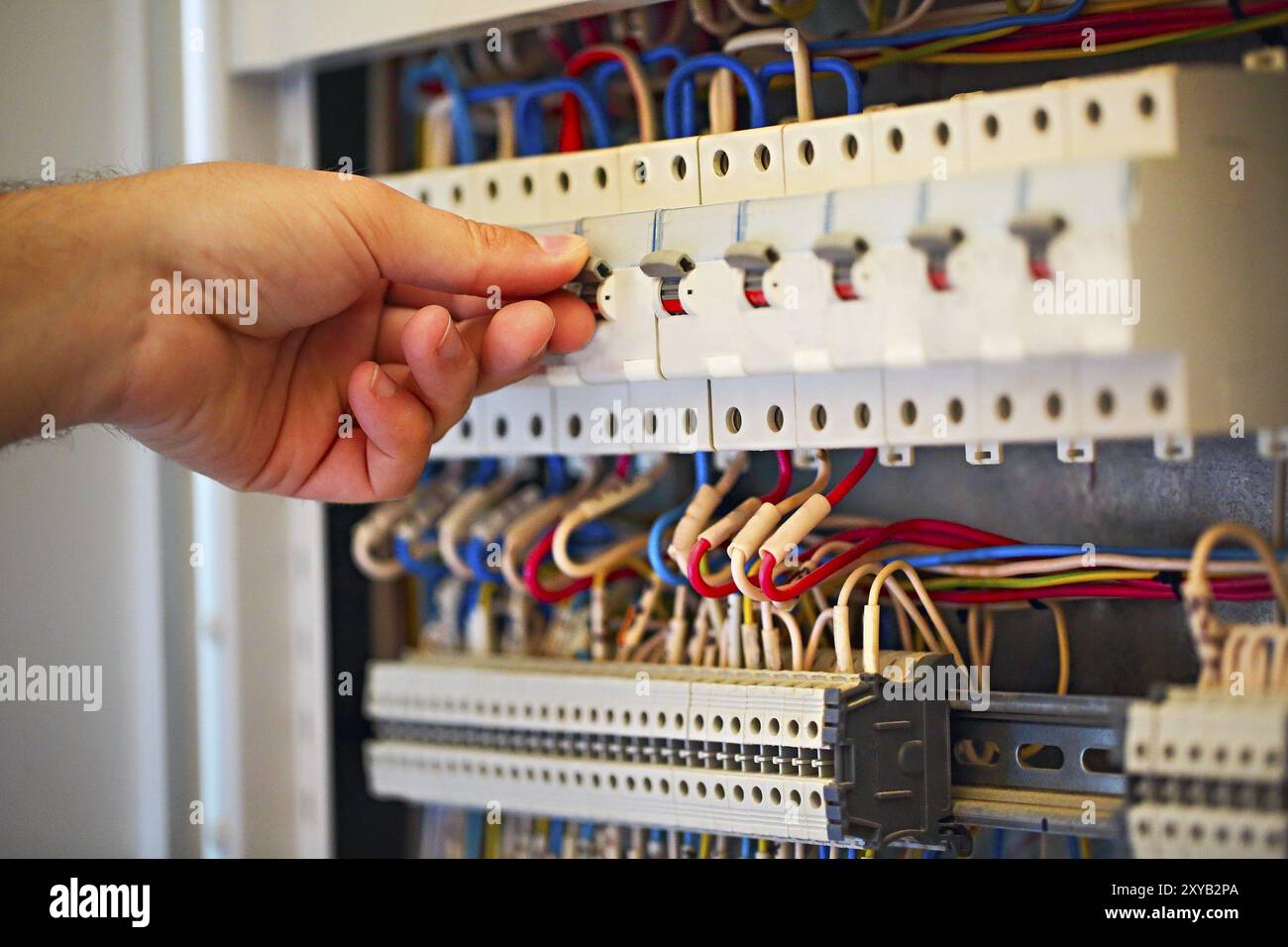 Electrician repairing electrical device hi-res stock photography and ...