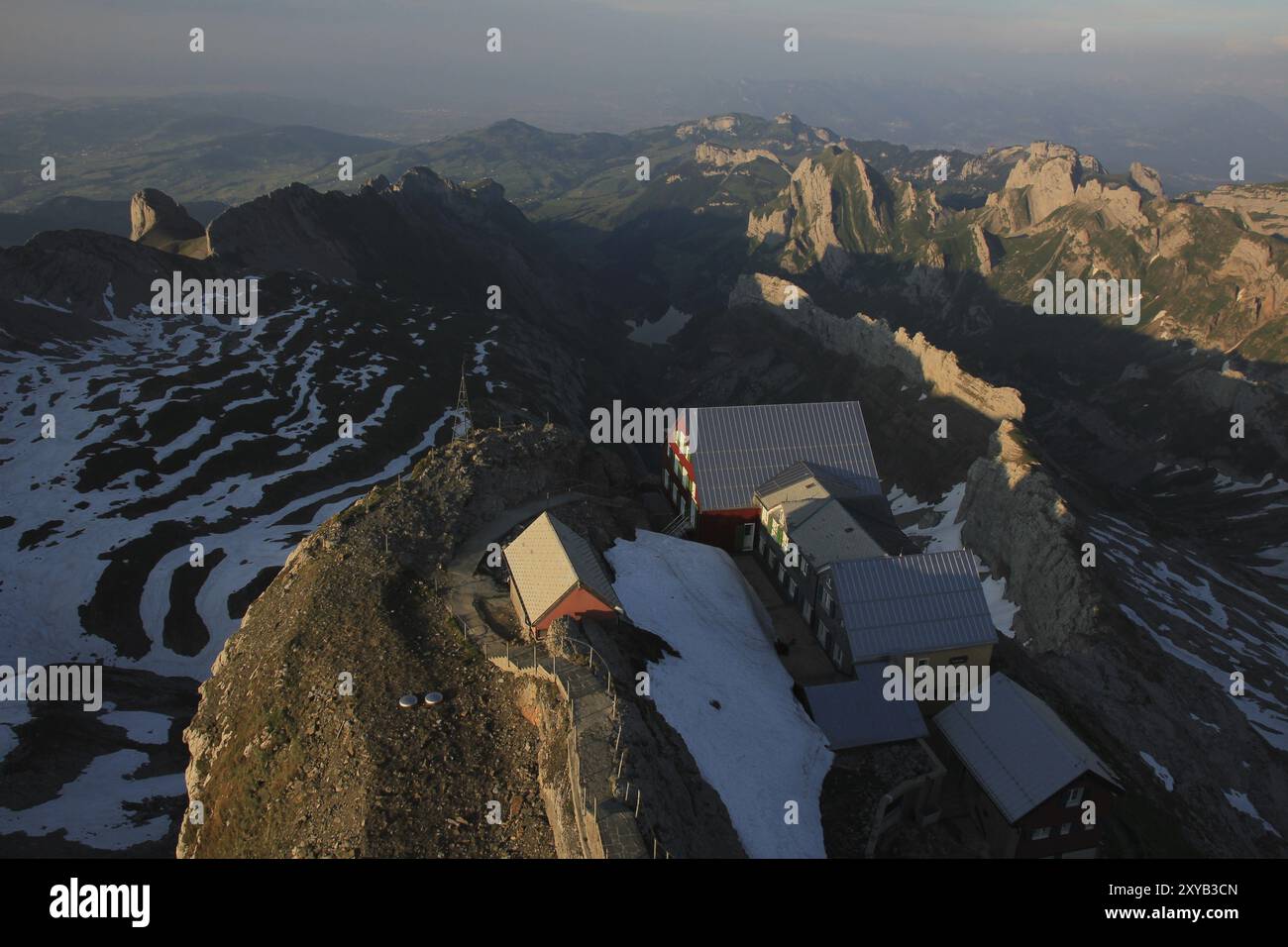View from Mount Santis towards lake Seealpsee and Appenzell. Old hotel ...