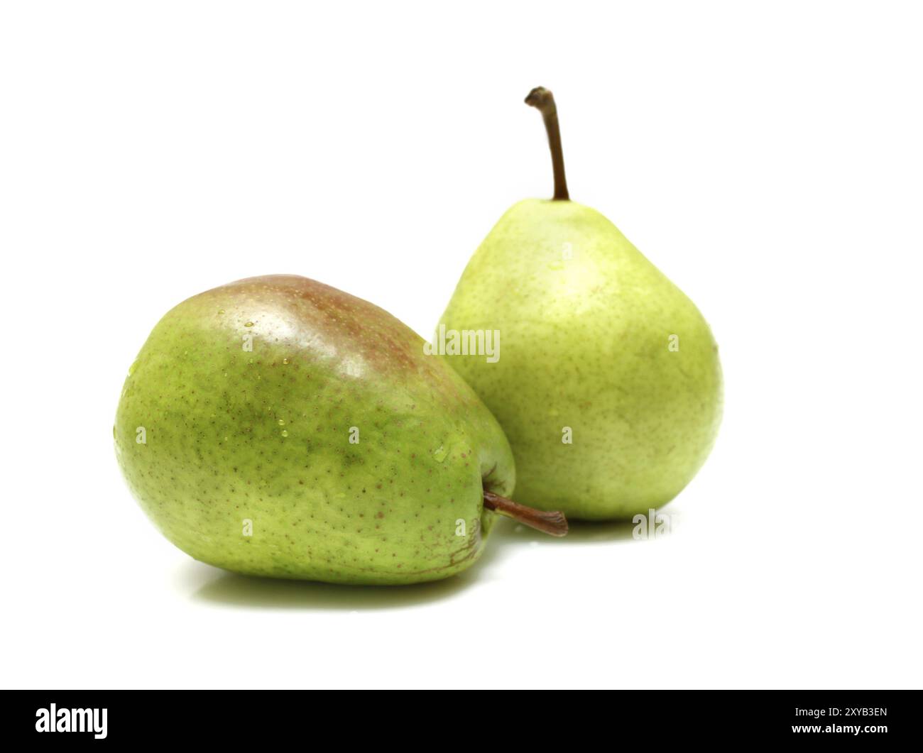 Two pears isolated on white background Stock Photo - Alamy