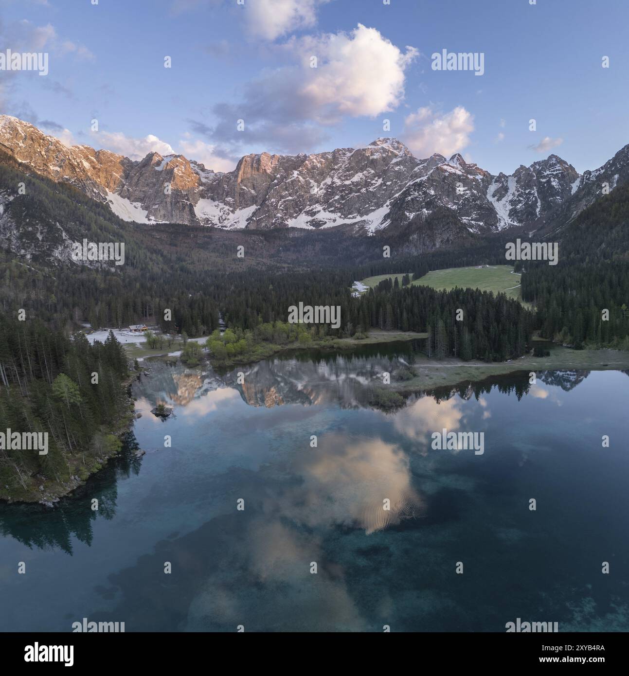 Aerial view of Lago Fusine with the Mangart massif in the background ...