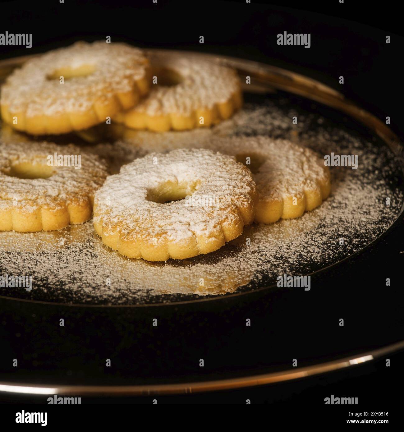 Five biscuits canestrelli with icing sugar above Stock Photo - Alamy