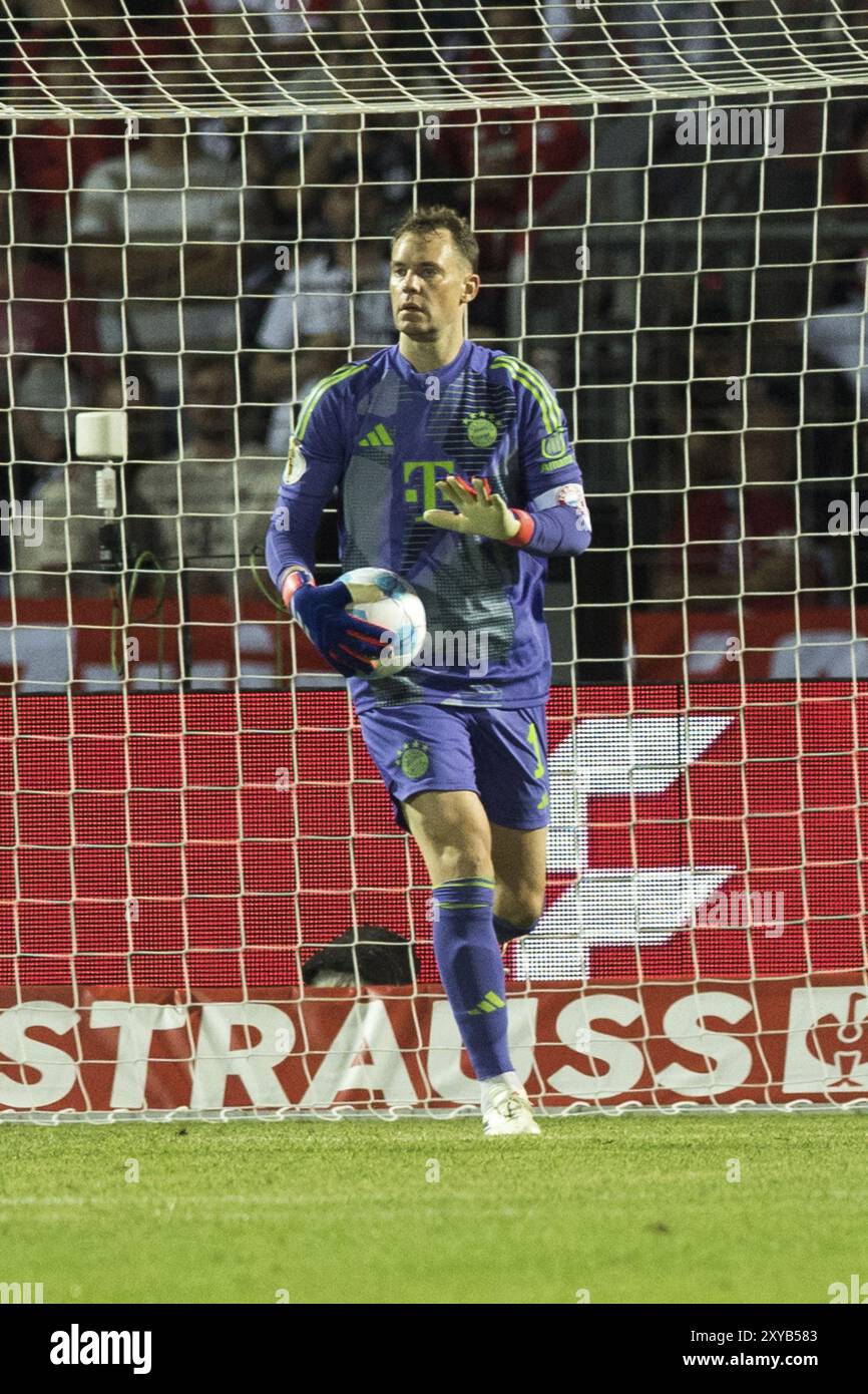 Football match, Manuel NEUER FC Bayern Munich holds the ball securely ...