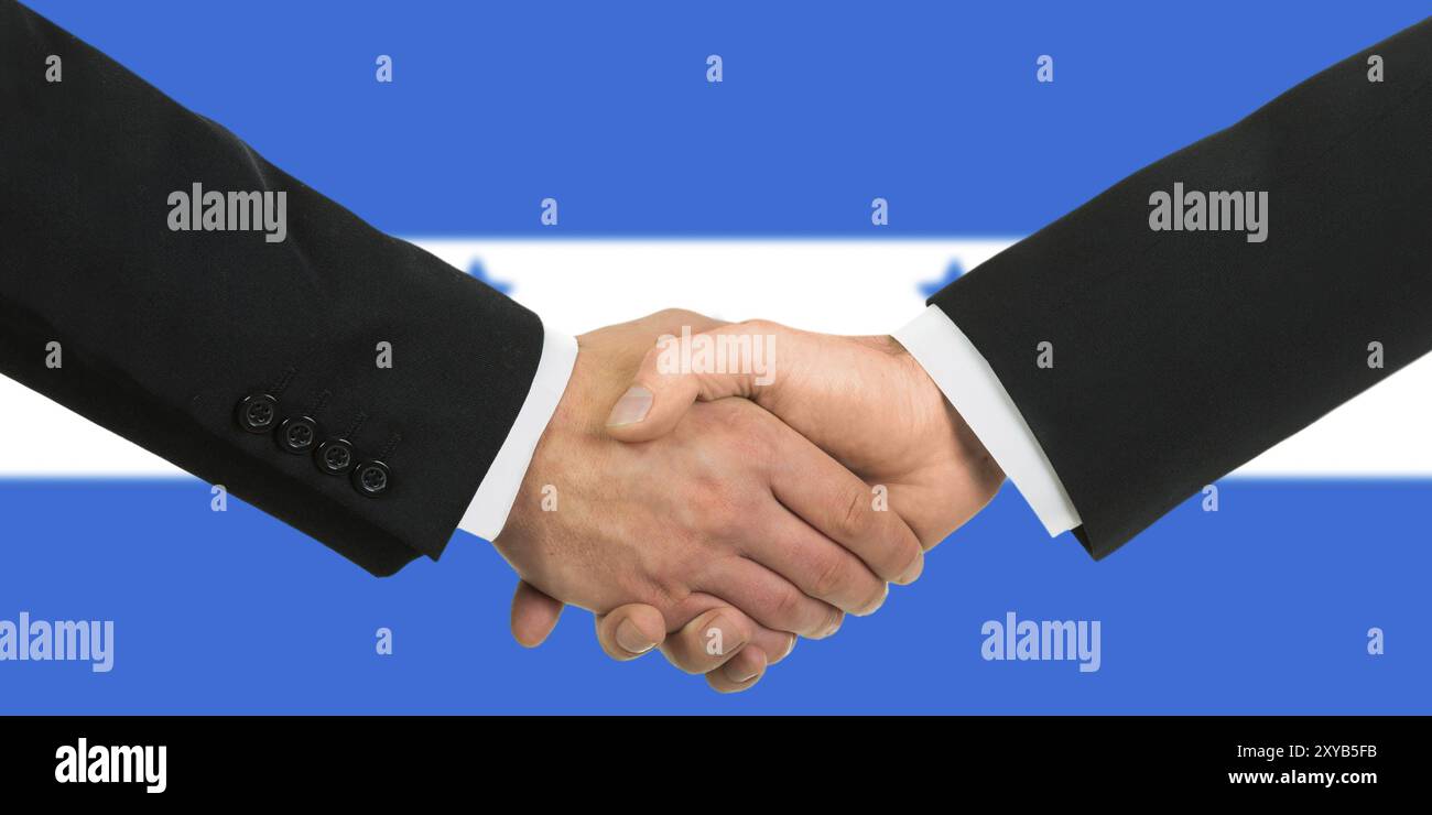 The Honduran flag and business handshake Stock Photo - Alamy