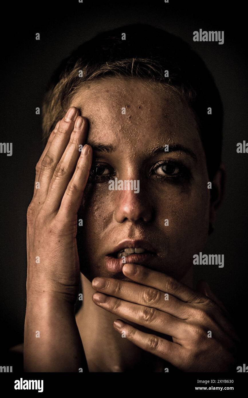 Women pain touch face hi-res stock photography and images - Alamy