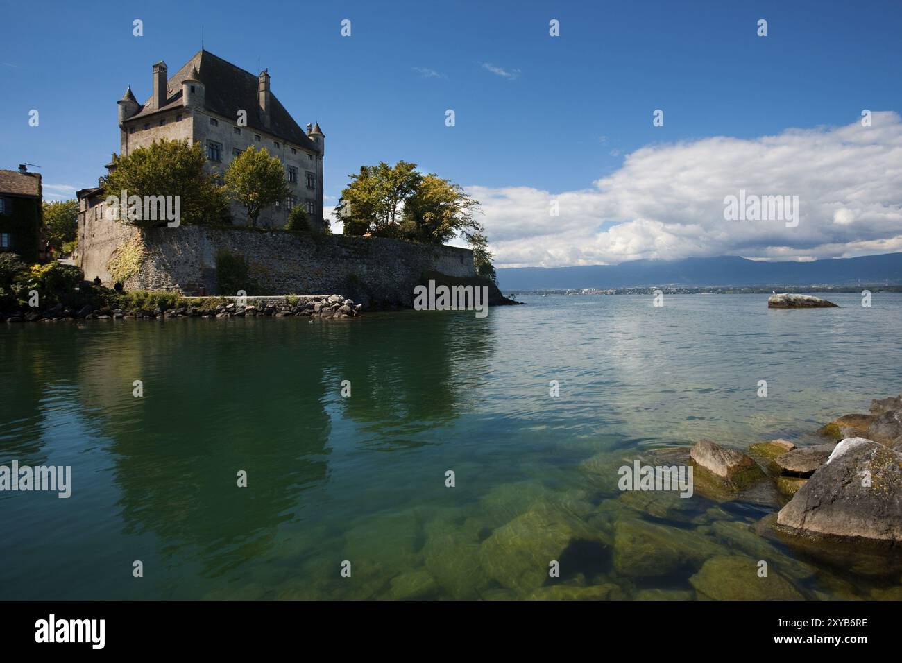 Yvoire's fortified castle is wonderfully reflected in the crystal clear ...