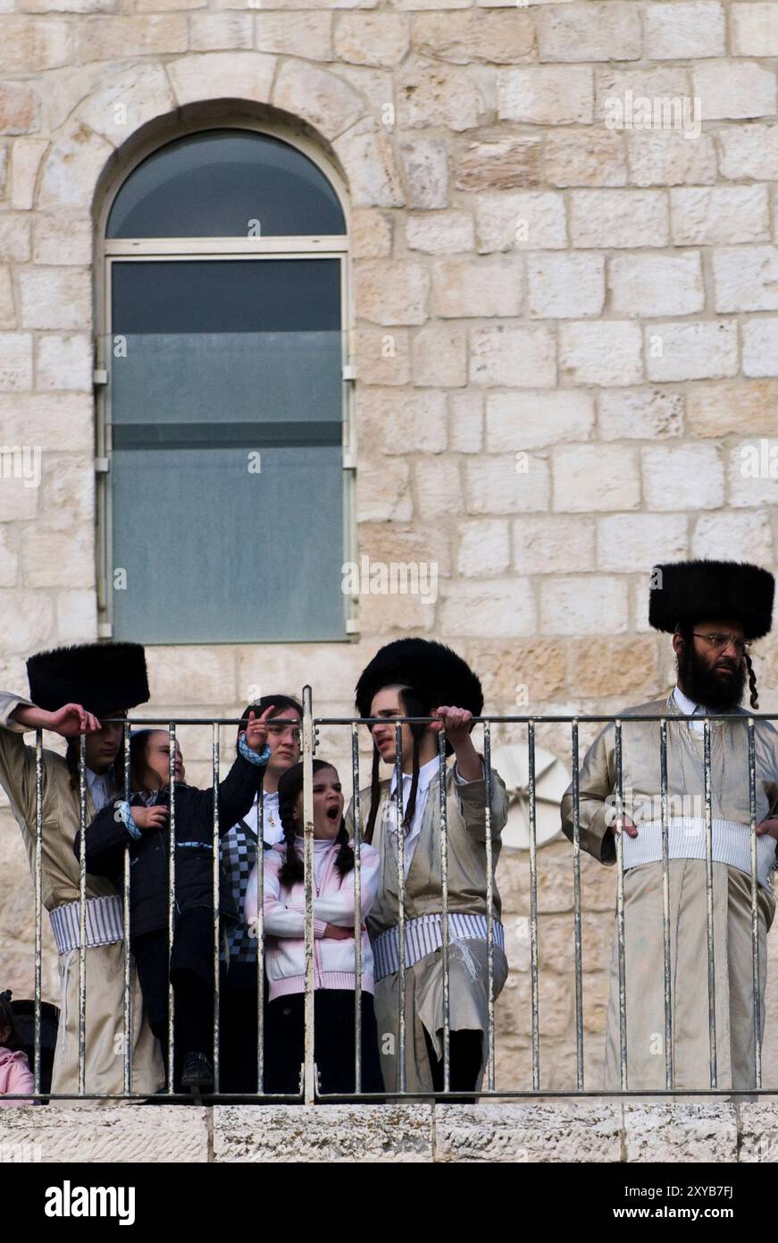 An Orthodox Jewish family dressed up for the Passover holiday. Jewish ...