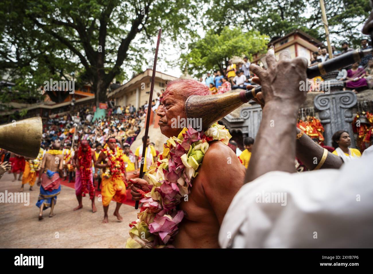 GUWAHATI, INDIA, AUGUST 19: Priests dance in the beat of Dhol (Drum ...