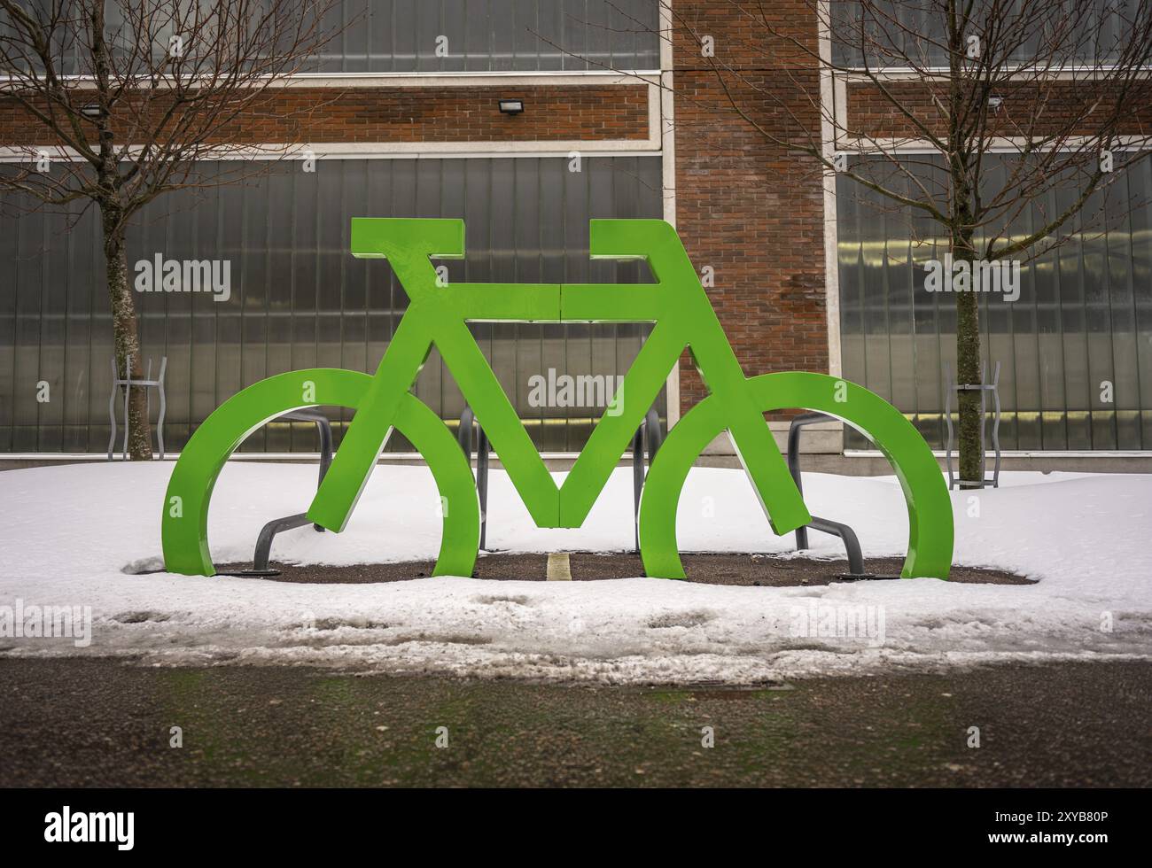 Green cycle installation marking a bicycle parking Stock Photo - Alamy