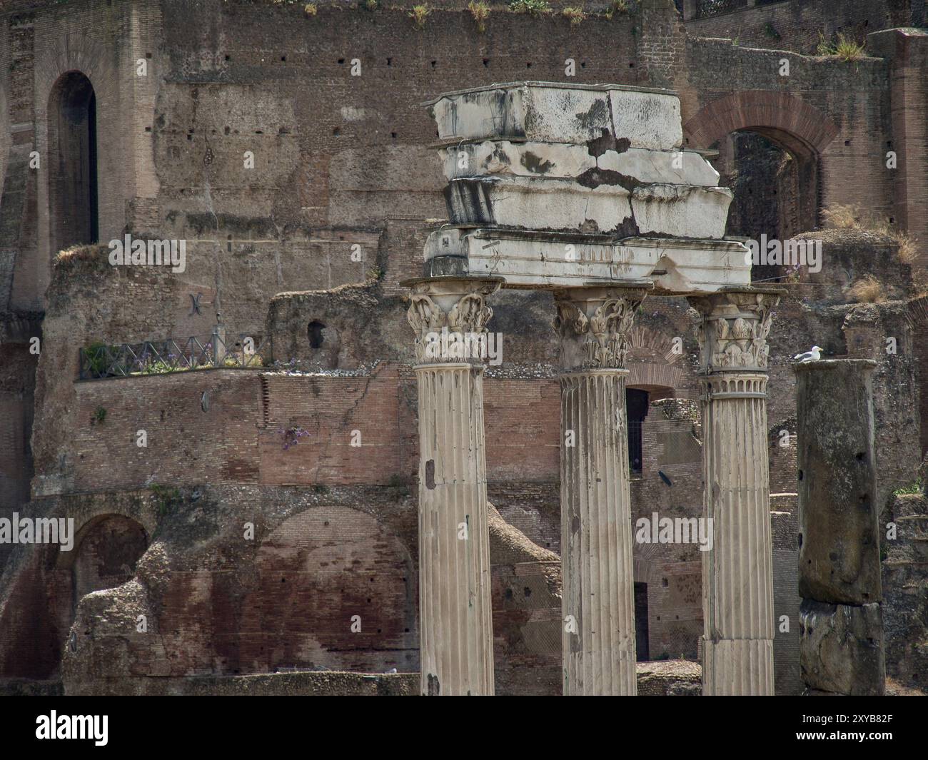 Ancient, crumbling columns and ruins made of stone with historical ...