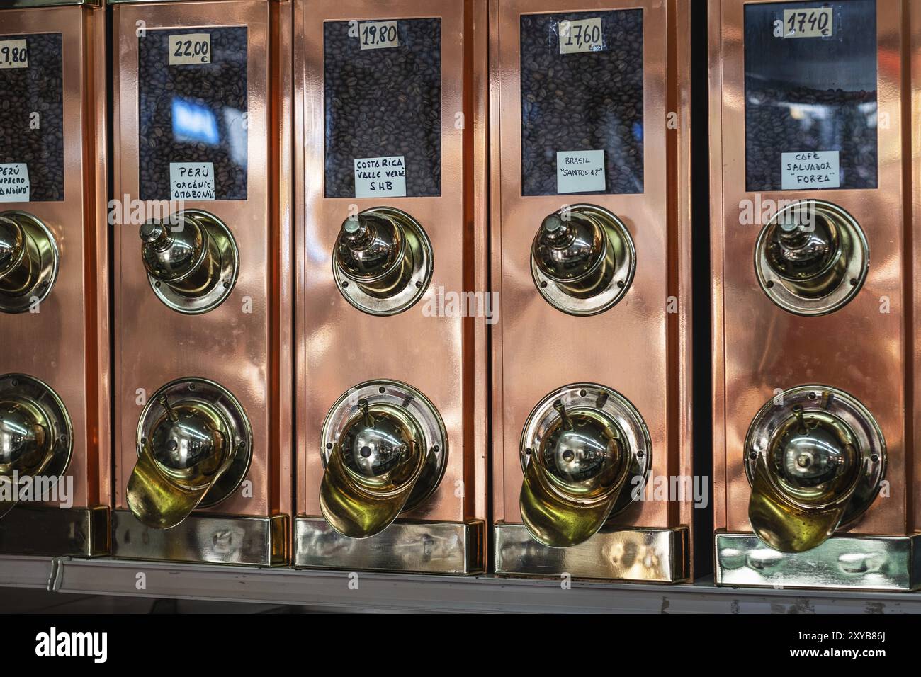 Old-fashioned brass coffee bean collector in a roastery in Barcelona ...