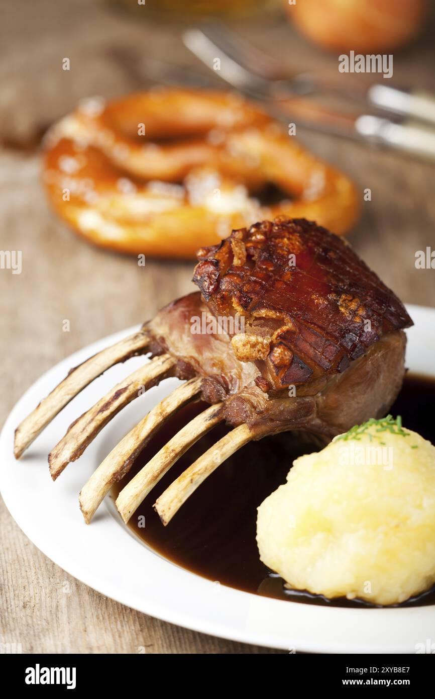 Roast suckling pig with dumplings Stock Photo - Alamy