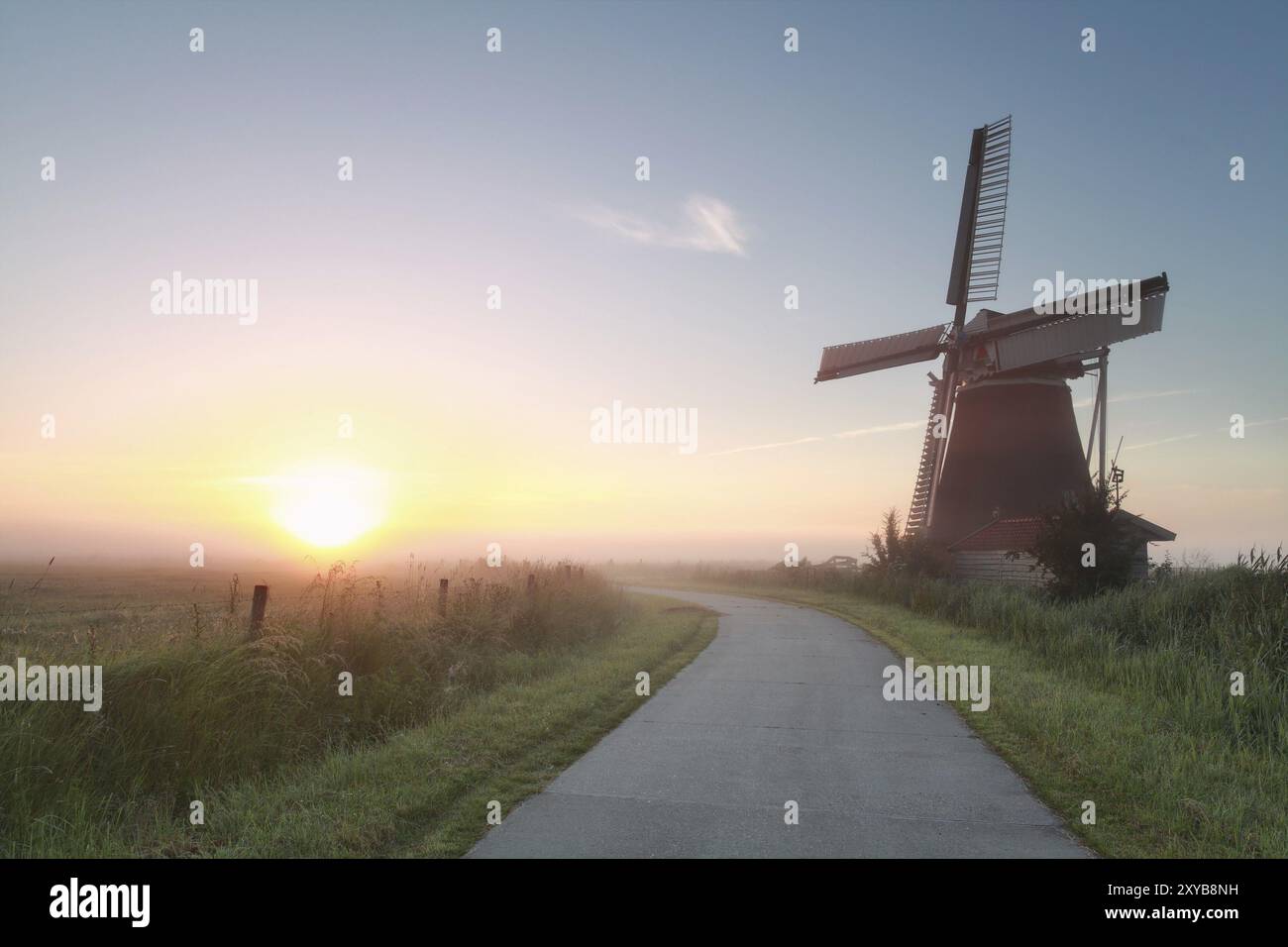 Beautiful sunrise behind windmill, Netherlands Stock Photo - Alamy