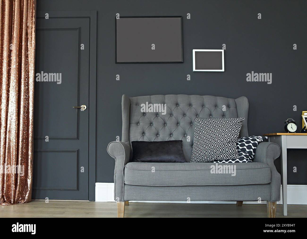 Classic interior of a room with door, sofa, table and decoration Stock ...