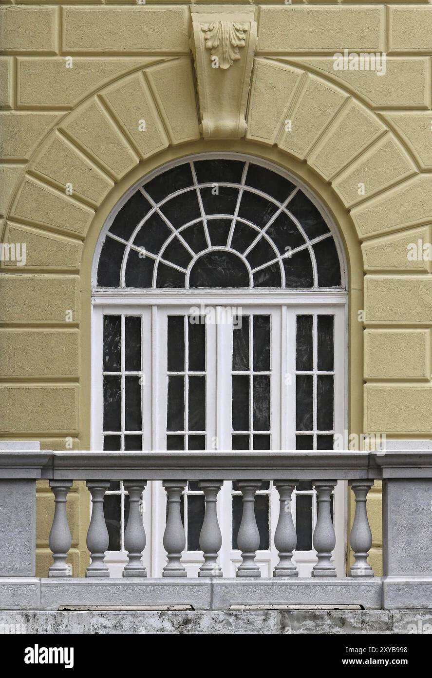 Vaulted mansion window with carved stone fence Stock Photo - Alamy