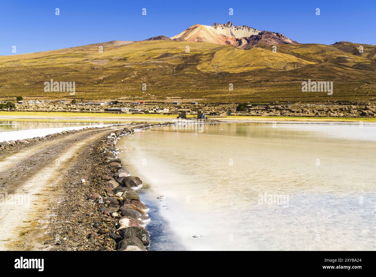 Dormant volcano and the salt lake at Solar De Uyuni, Bolivia, South ...