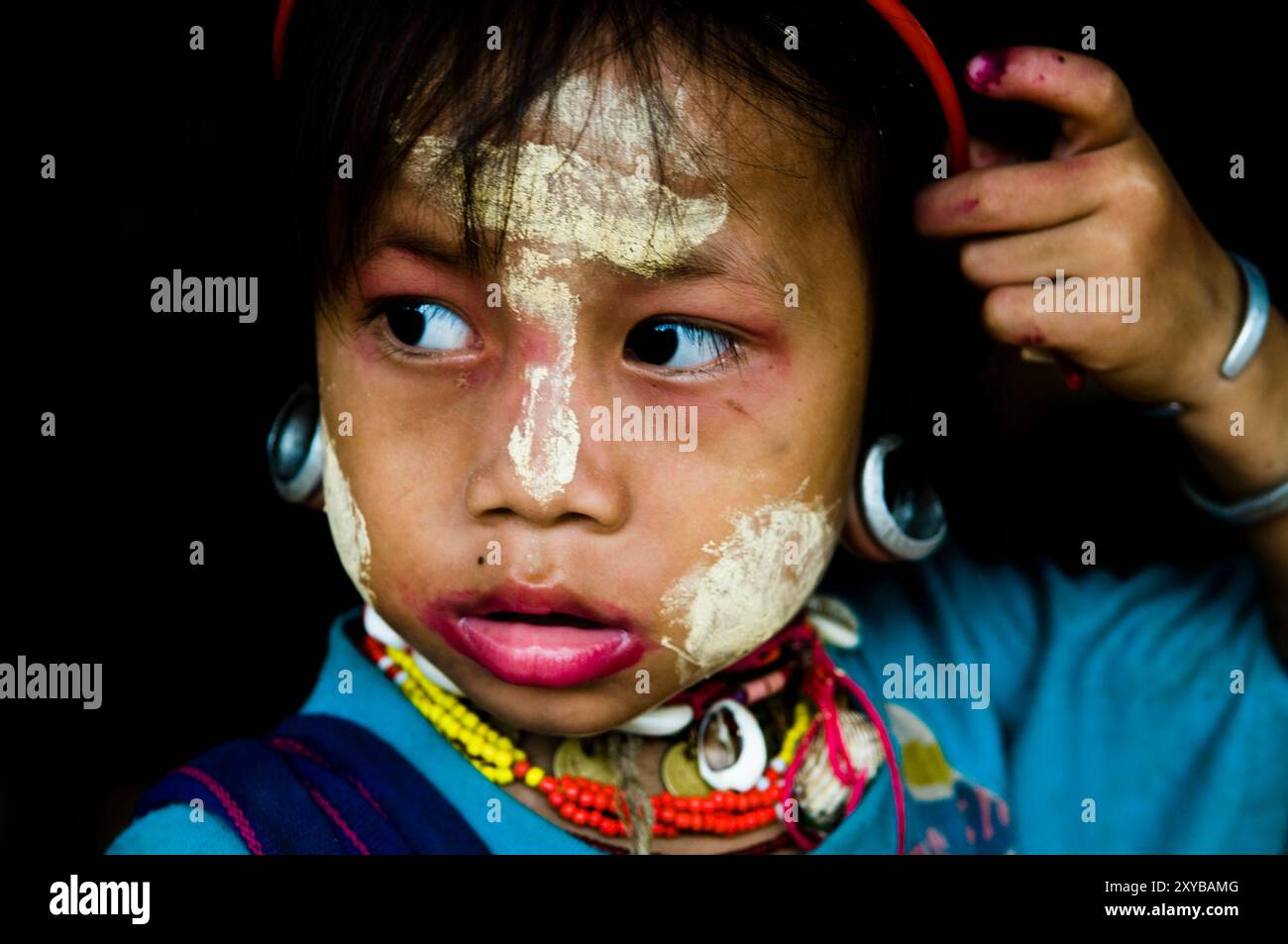 Portrait of a Gayo Karen refugee taken in a refugee camp on the Thai ...