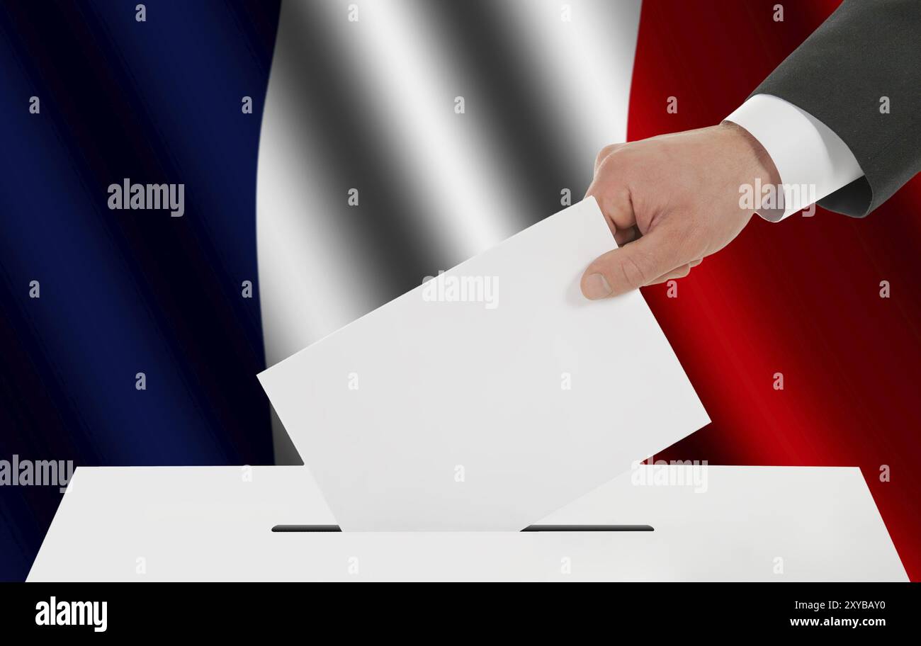 The French flag and the hand with the bulletin about the ballot box ...