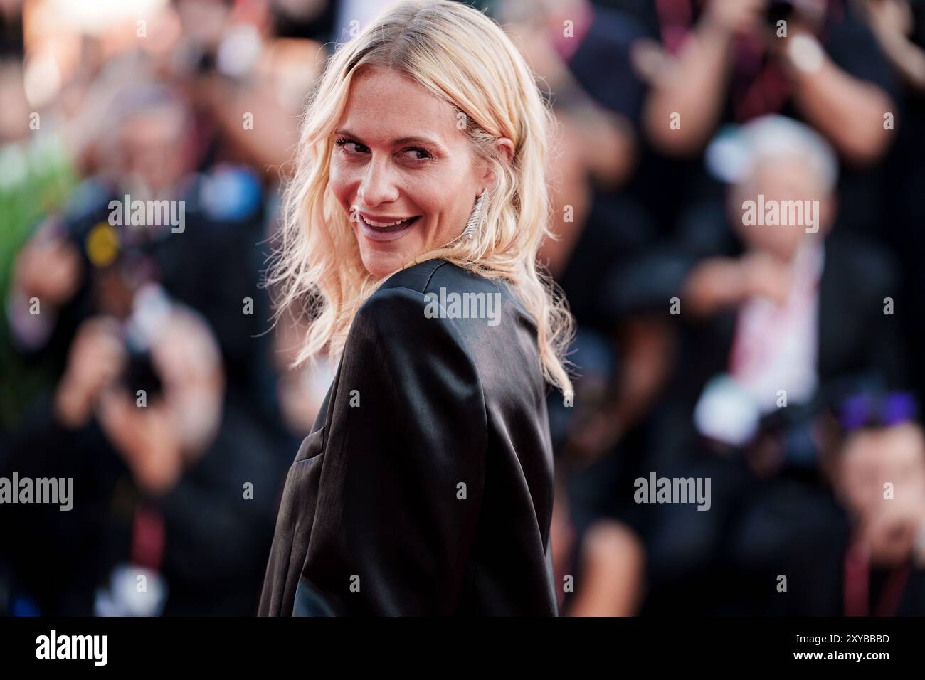 VENICE, ITALY - AUGUST 28 2024 - Opening red carpet - Poppy Delevingne ...