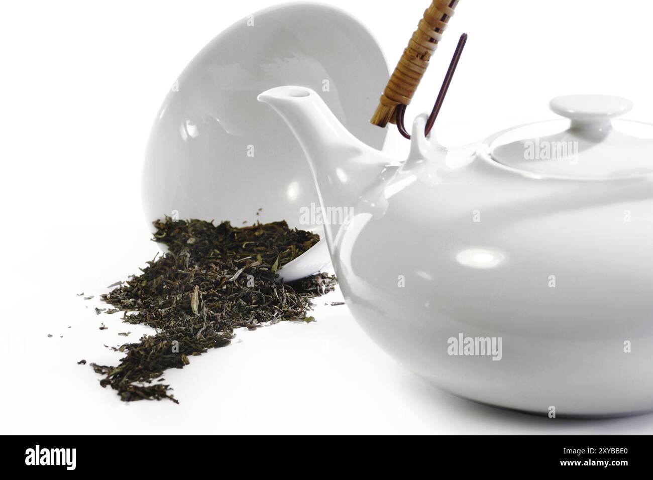 Teaware white in white like clinical, and some loose tea, nearly ...